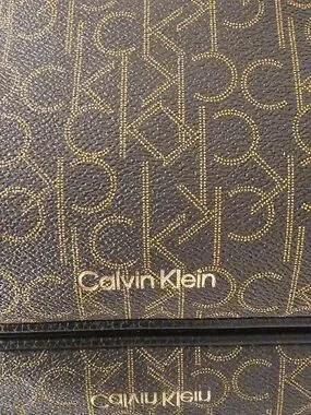 Calvin Klein | Bags | Calvin Klein Brown Monogram Logo Wristlet Clutch ...